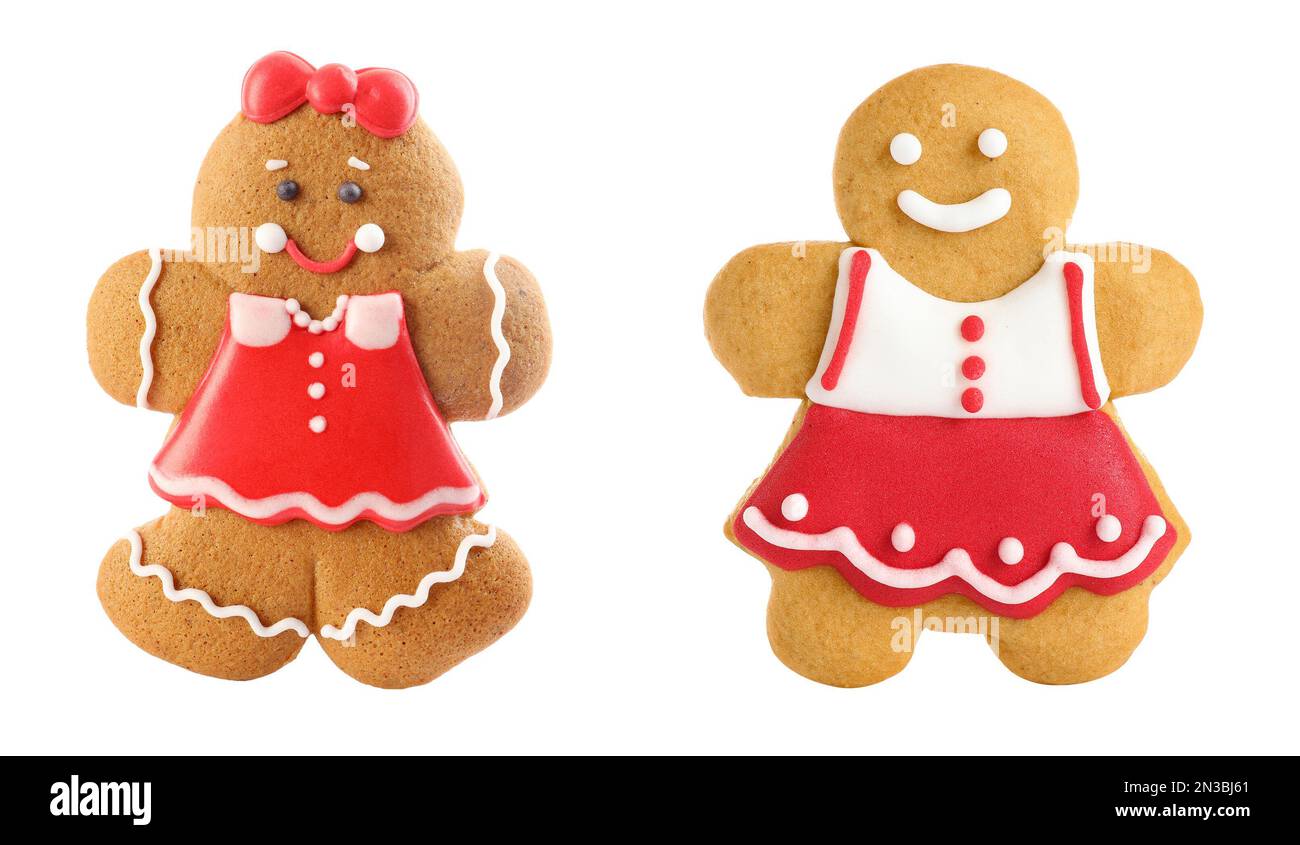 Two gingerbread women isolated on white. Decorated cookies Stock Photo ...
