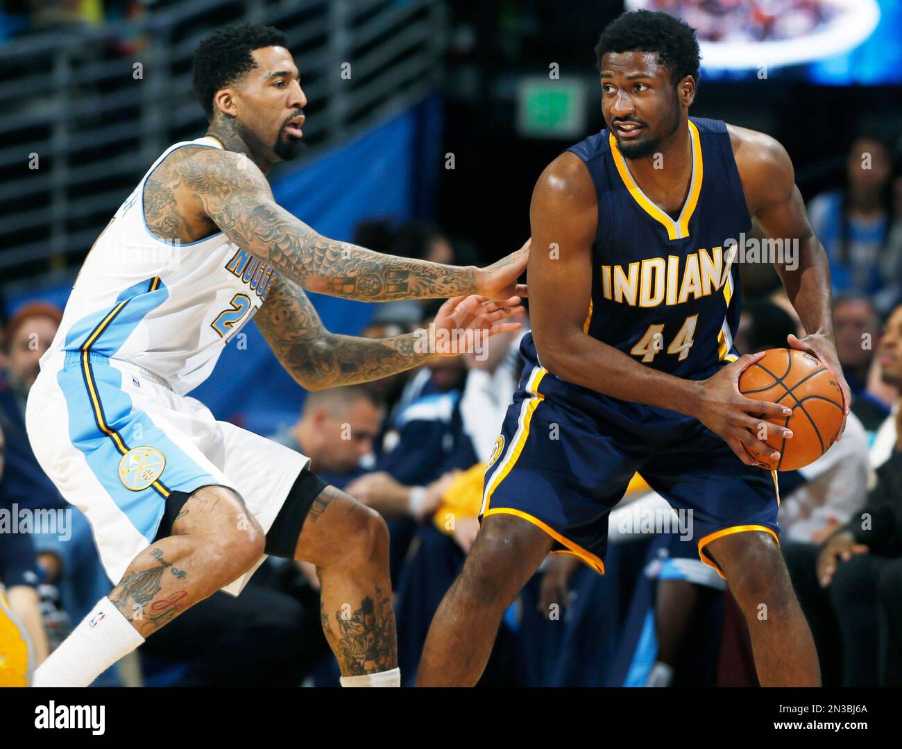 Indiana Pacers forward Solomon Hill, right, looks to pass the ball as ...