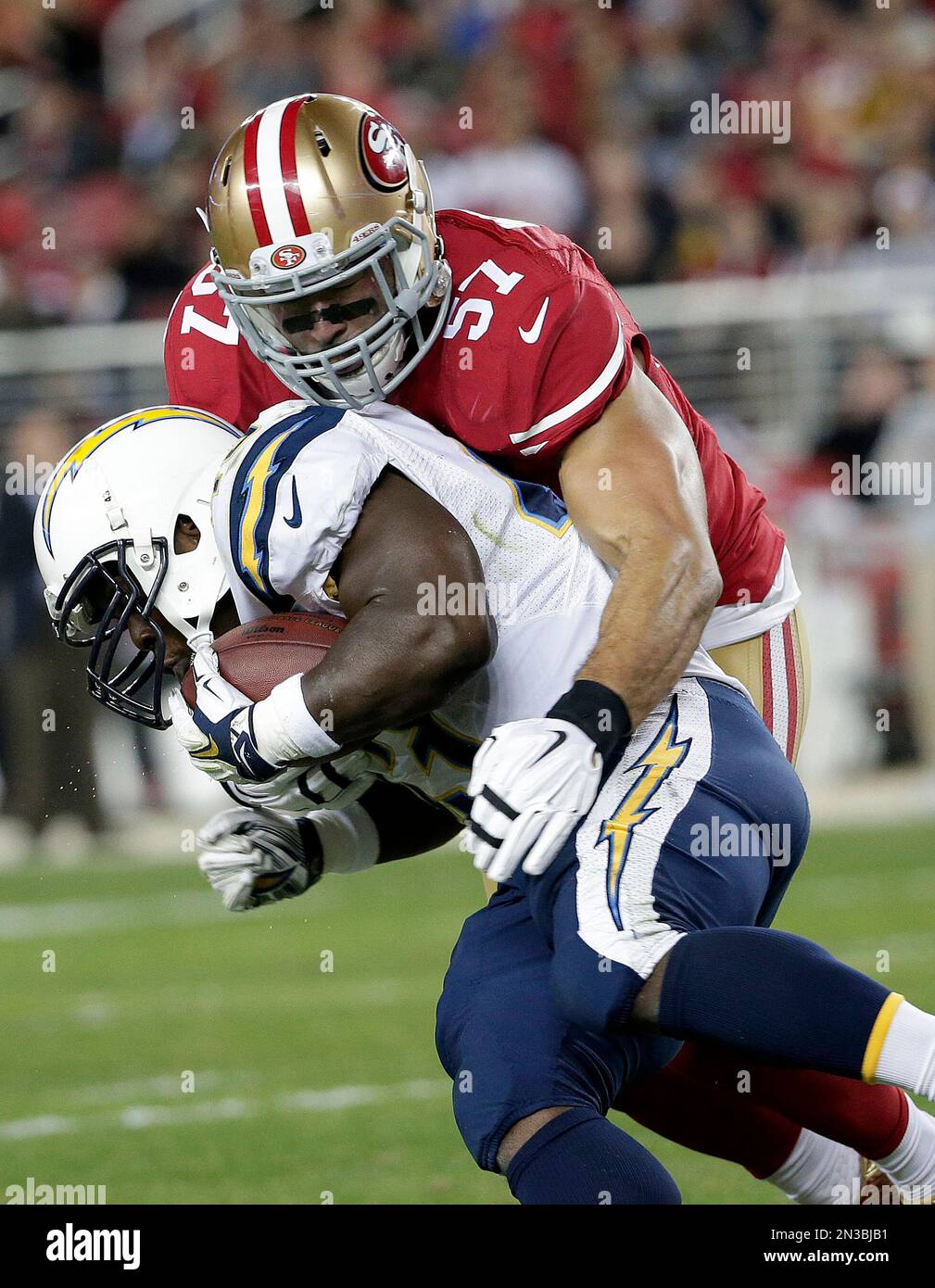 San Francisco 49ers linebacker Michael Wilhoite (57) tackles San Diego ...