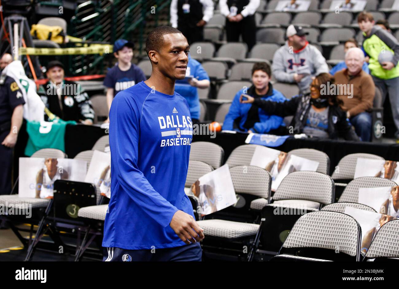 Dallas Mavericks guard Rajon Rondo enters the playing court for team ...