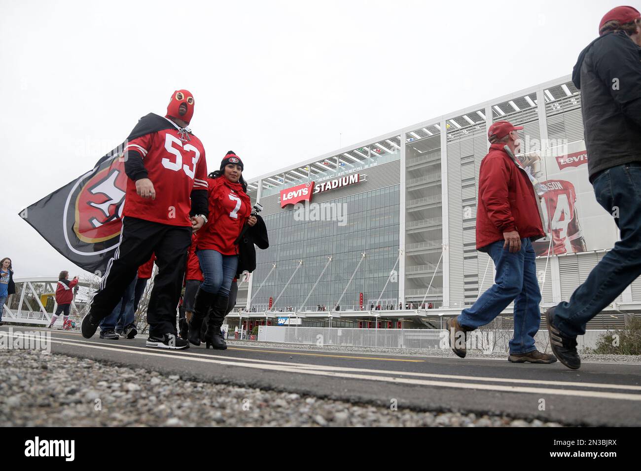 San Francisco 49ers fans walk outside of Levi's Stadium before an NFL ...