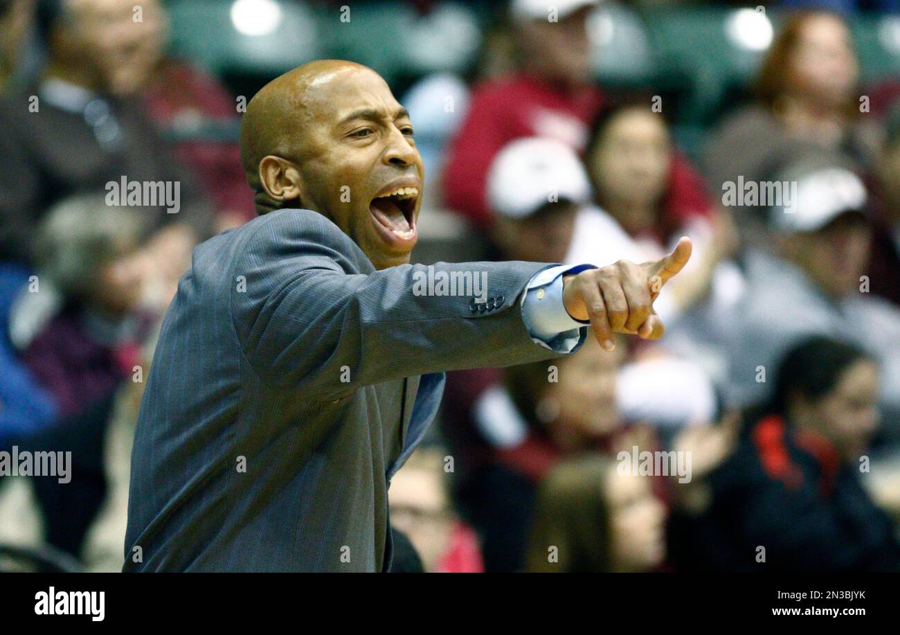 Mississippi State basketball coach Rick Ray encourages his players in ...