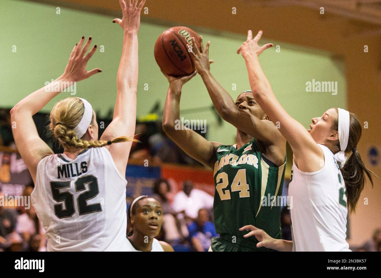 Baylor guard Ieshia Small (24) fights her way to the basket against ...