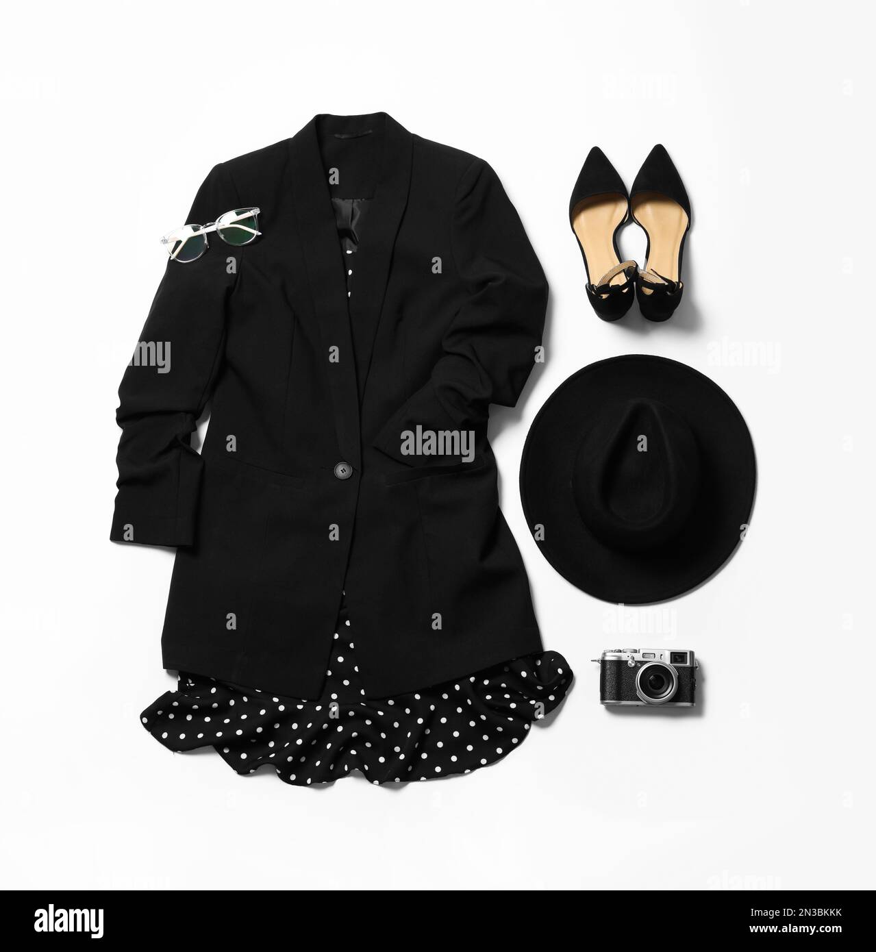 Flat lay composition with stylish black dress on white background Stock ...