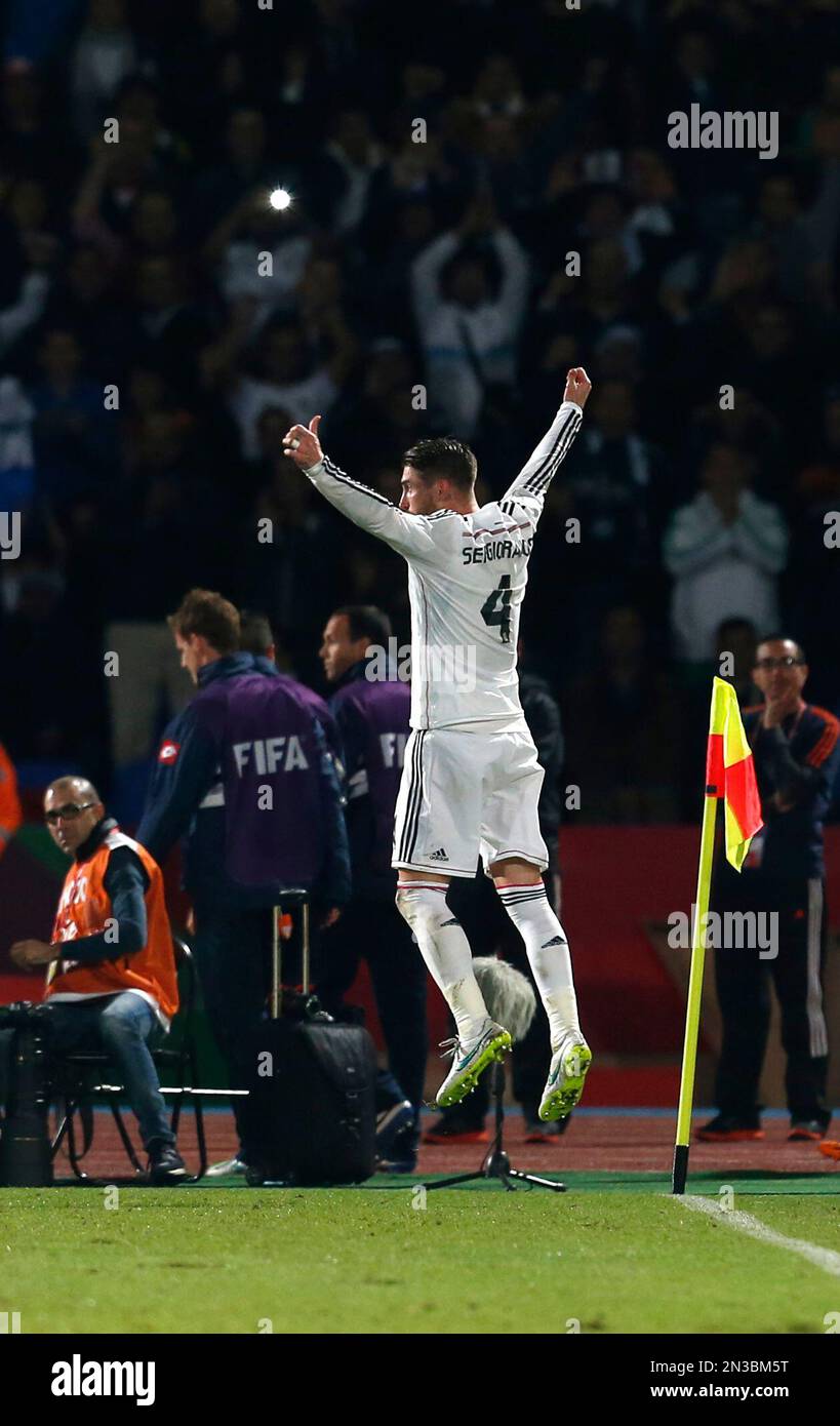 Real Madrid’s Sergio Ramos jumps to celebrate after scoring the opening ...