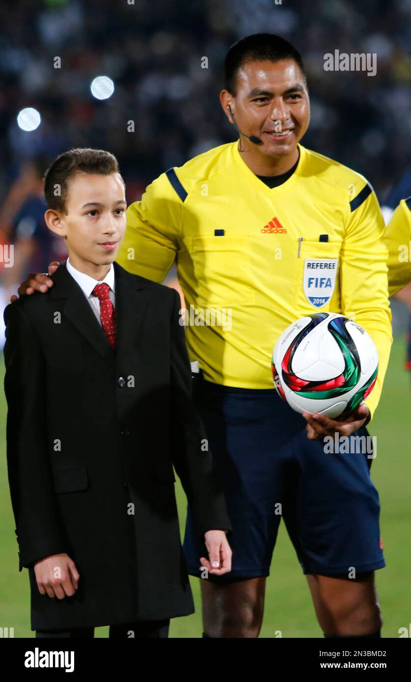 Moroccan Crown Prince Moulay El Hassan, left, and referee Walter Lopez ...