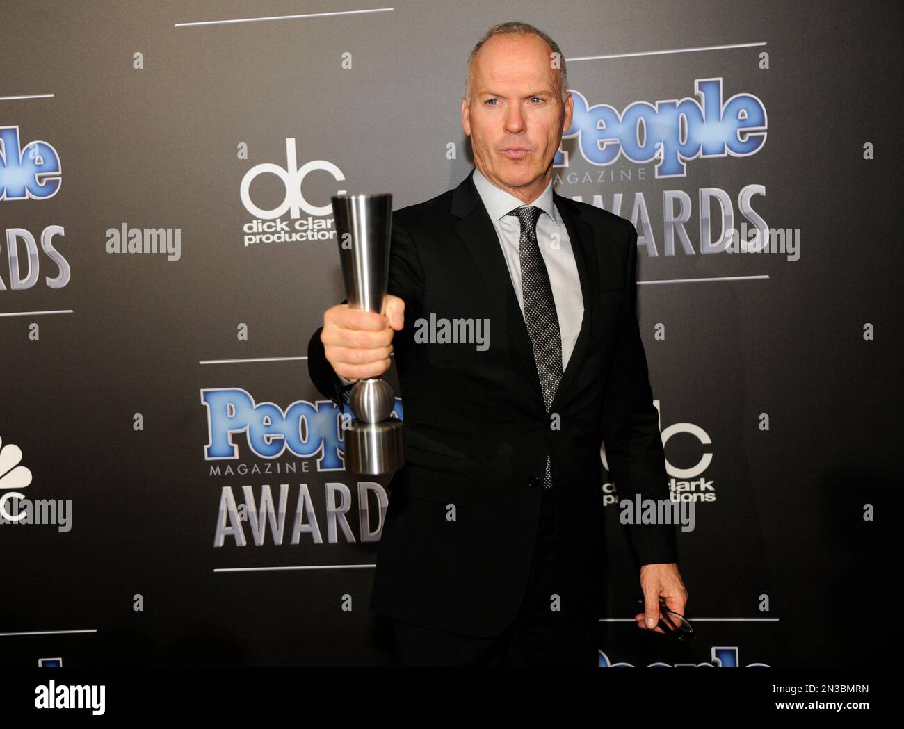 Michael Keaton poses backstage with the award for movie performance of ...