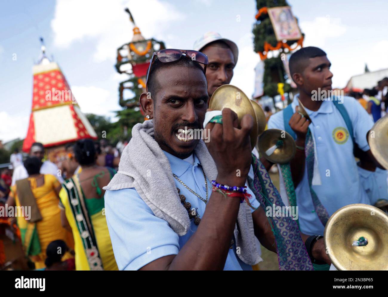 A Hindu devotee from Siva Sathi Alayam temple, is hooked with spikes ...