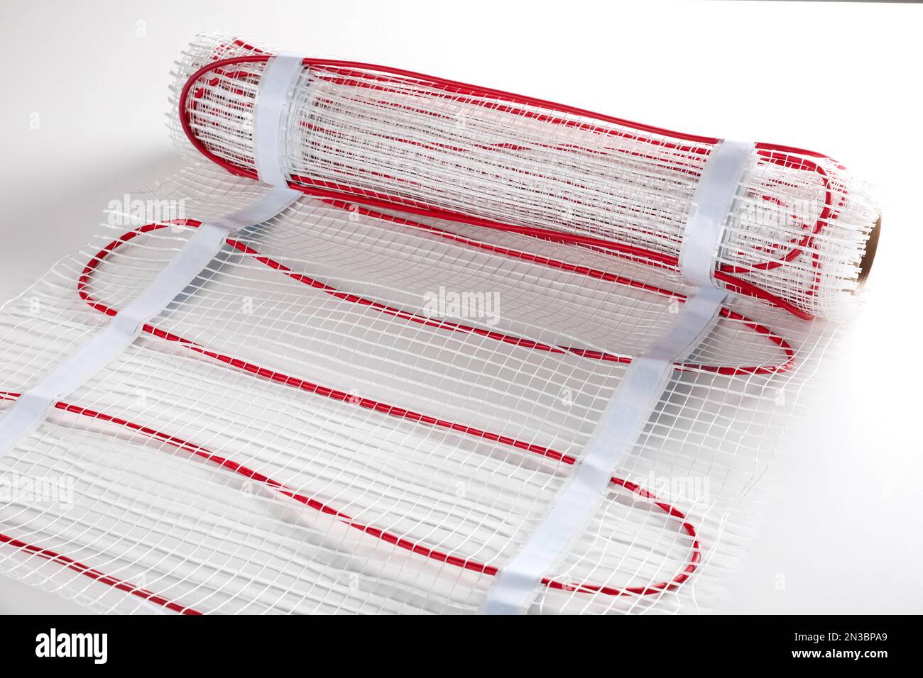 Installation of modern underfloor trace heating system indoors Stock ...