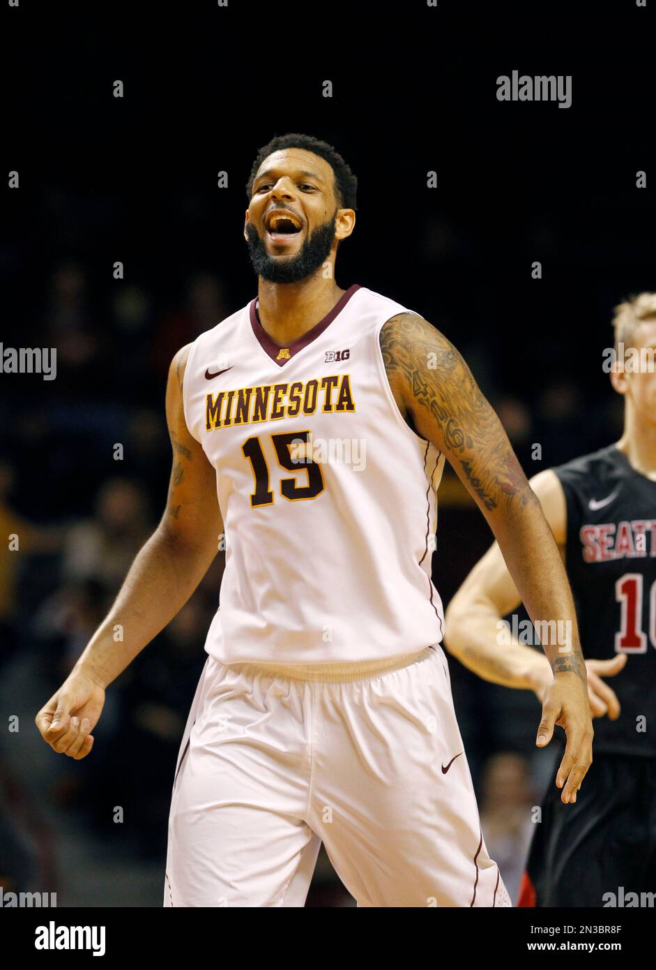 Minnesota forward Maurice Walker (15) reacts after a teammate made a ...