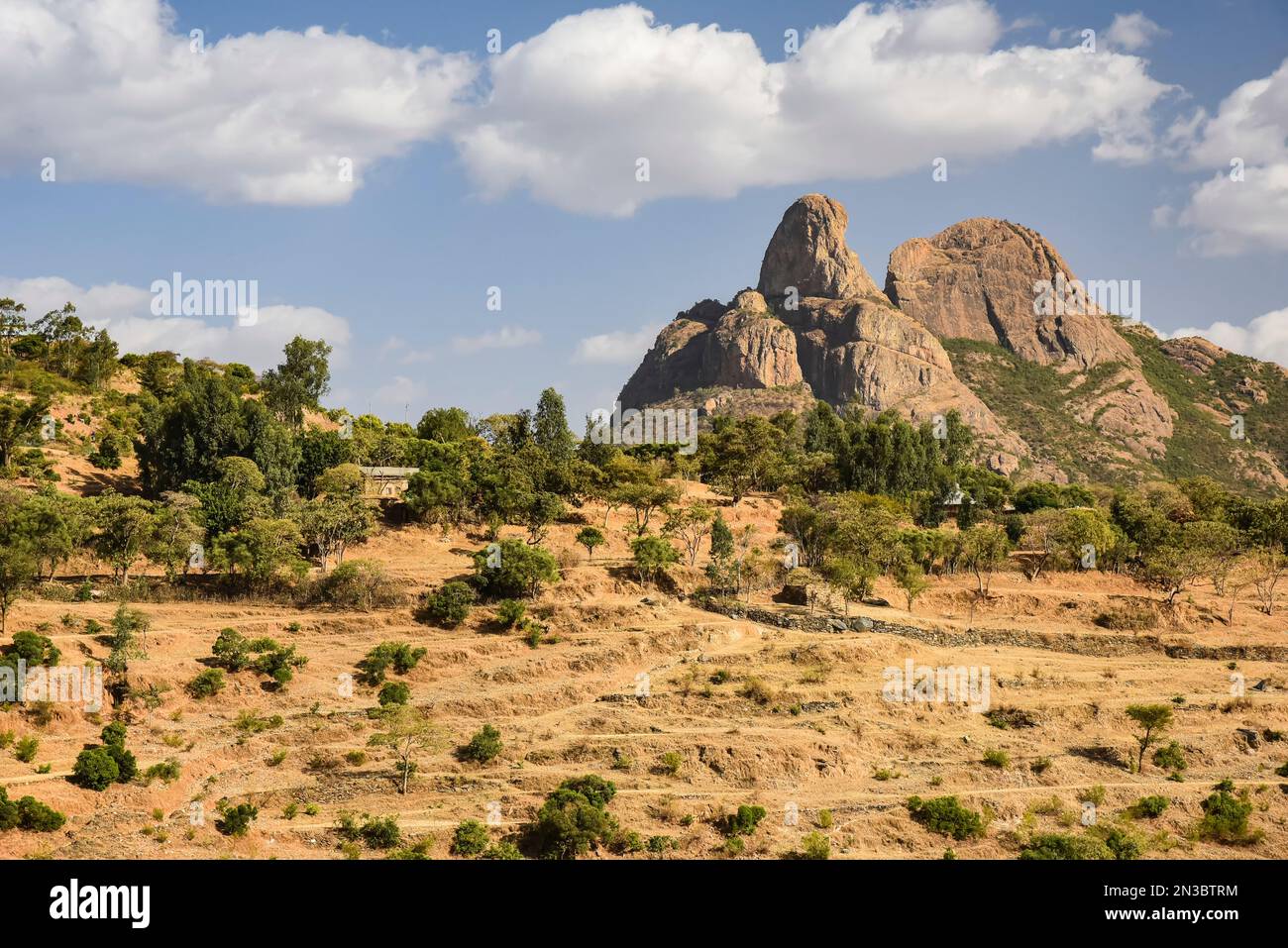 Mountainous rock formation and terraced farmland in the Ethiopian ...