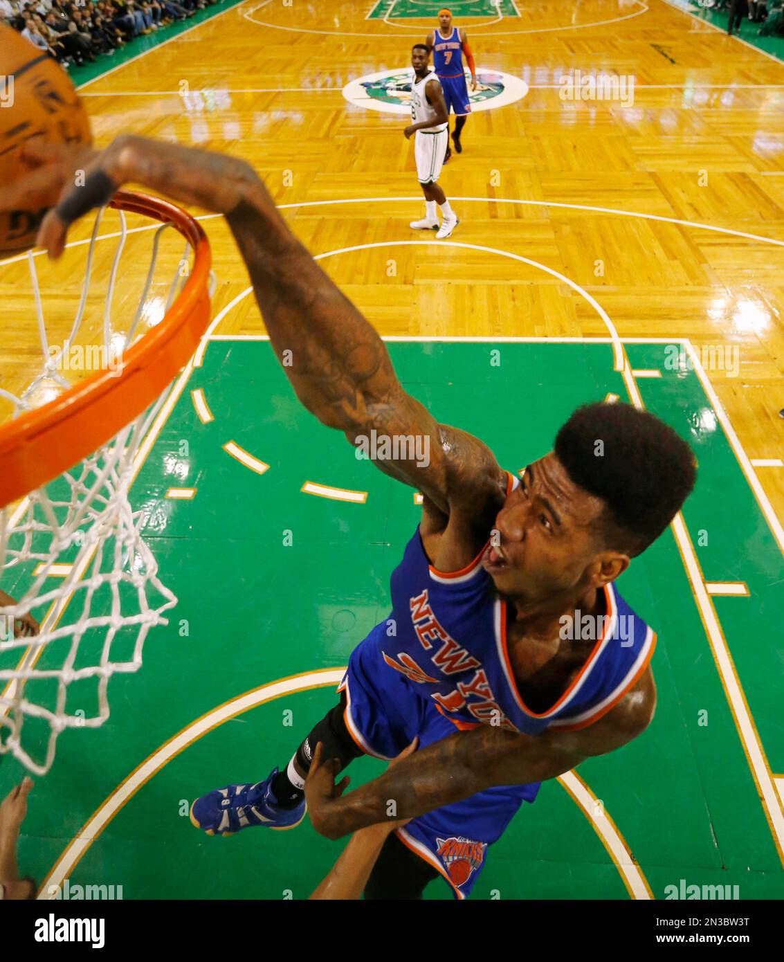 New York Knicks' Iman Shumpert goes for a dunk against the Boston ...