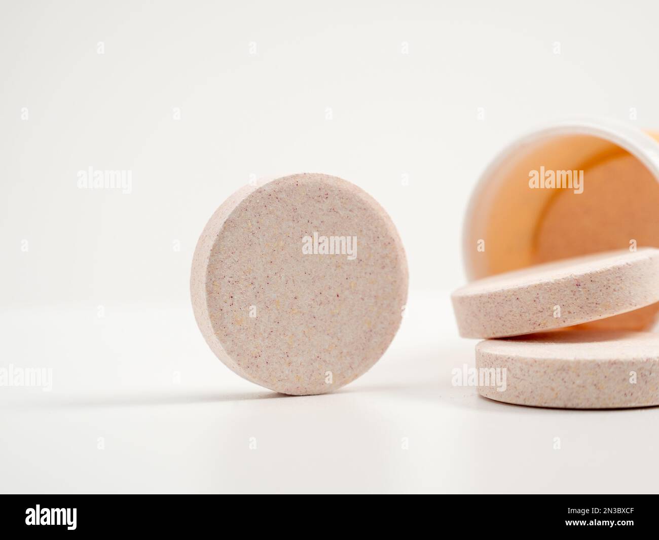 Effervescent multivitamin tablets on a white background. Close-up Stock ...