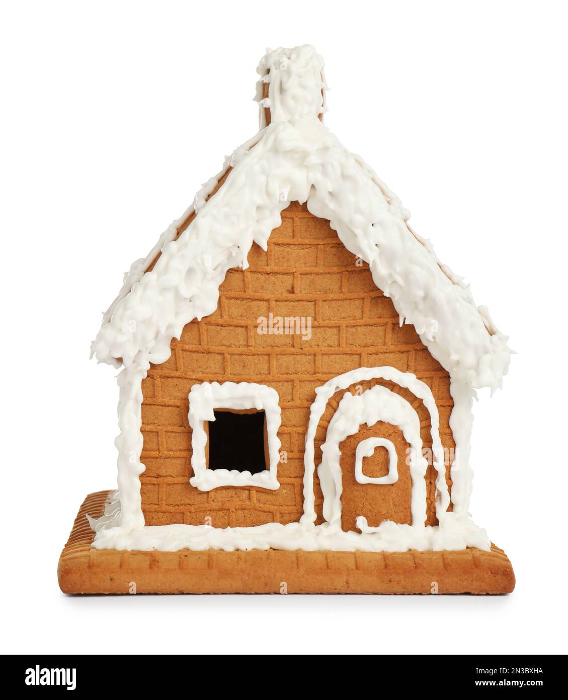 Beautiful gingerbread house decorated with icing on white background ...