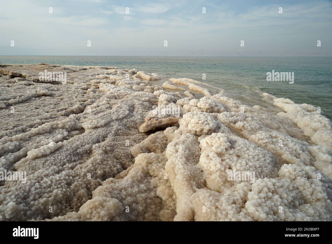 Dead Sea panoramic view with piles of mineral salt, Jordan and Israel ...