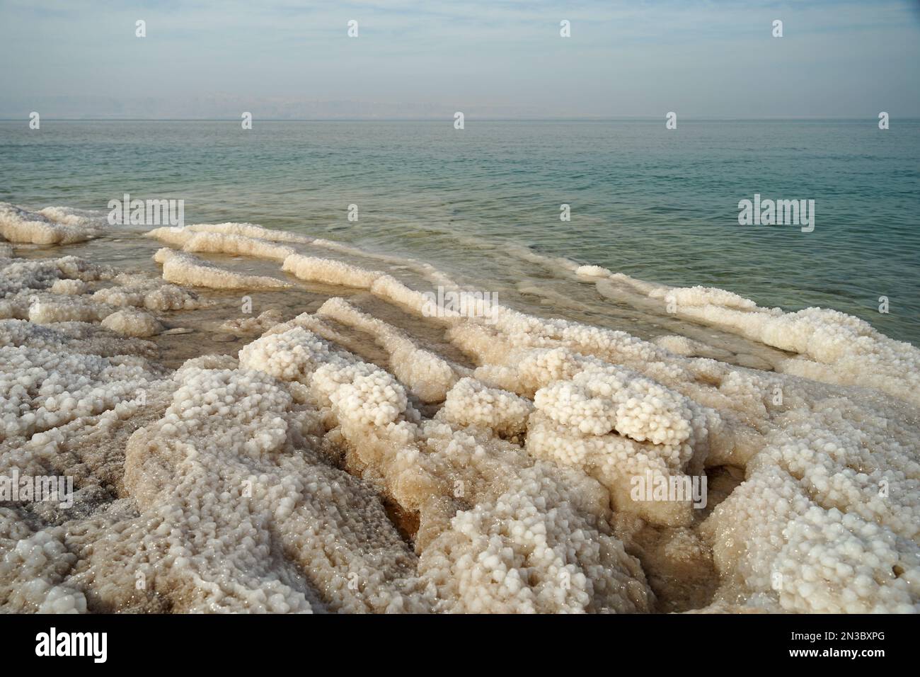 Dead Sea panoramic view with piles of mineral salt, Jordan and Israel ...