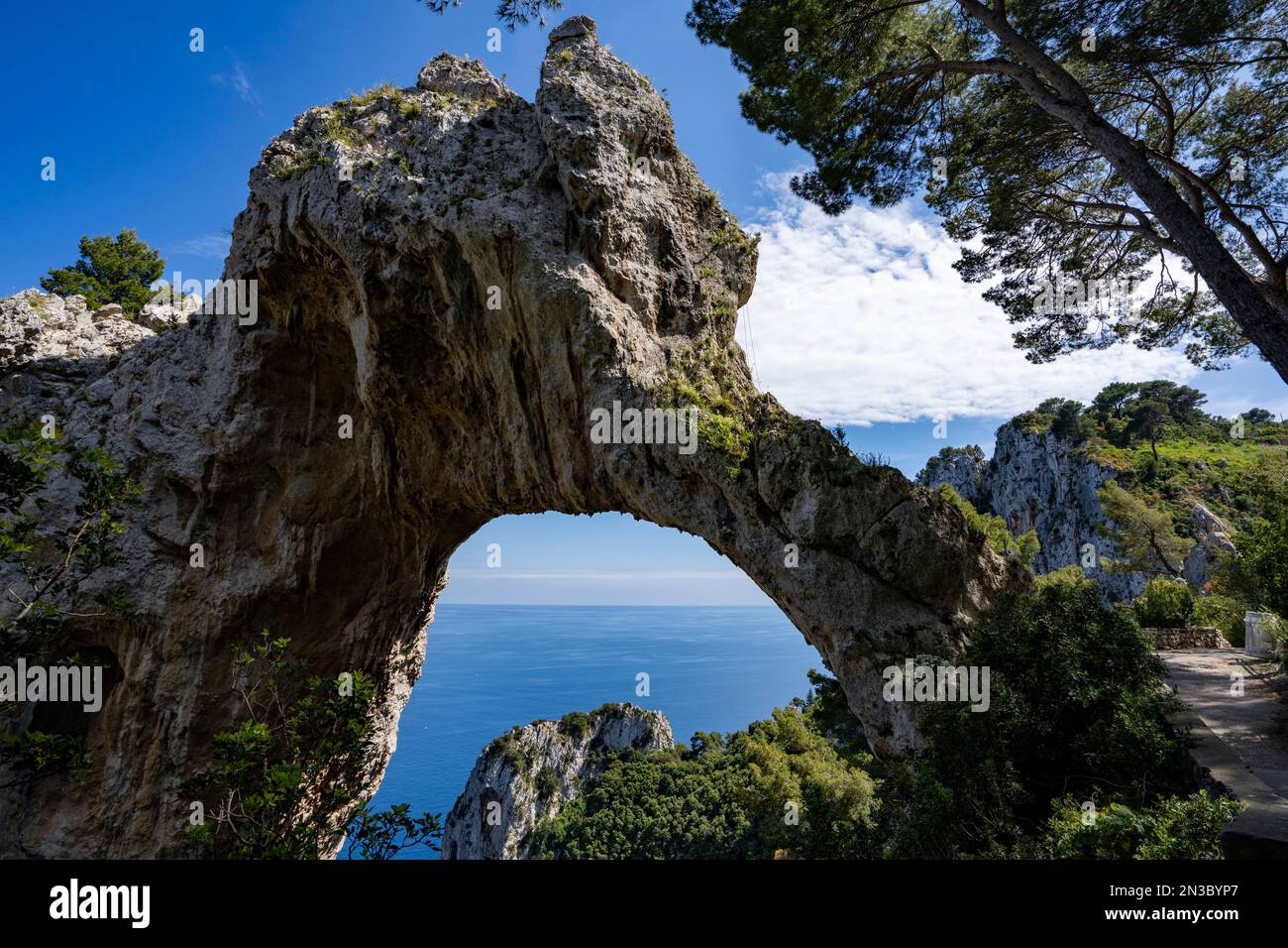 View through the Arco Naturale, a Palaeolithic era limestone arch ...