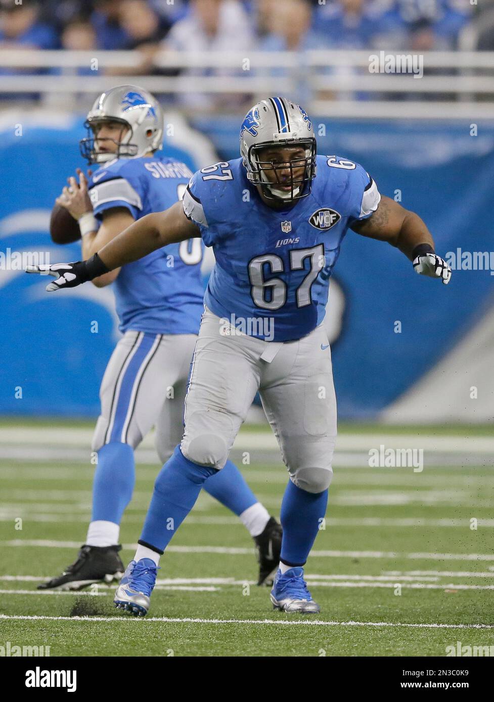 Detroit Lions guard Rob Sims (67) protects quarterback Matthew Stafford ...