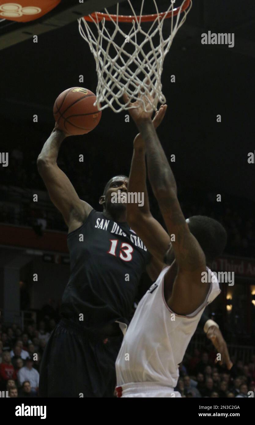 San Diego State's Winston Shepard shoots past Cincinnati's Octavius ...