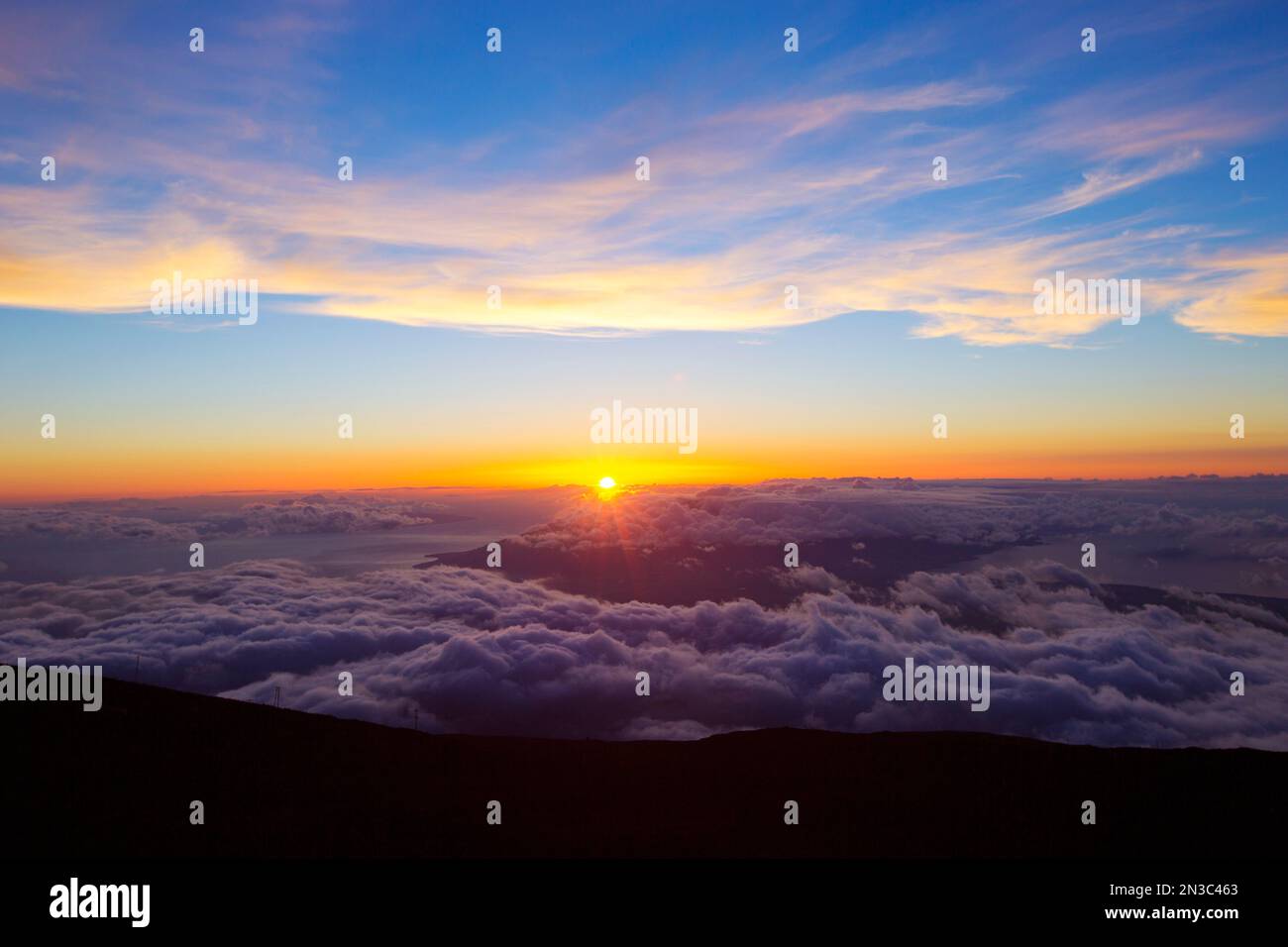 Magical sunset above the clouds on Haleakala; Upcountry Maui, Maui ...