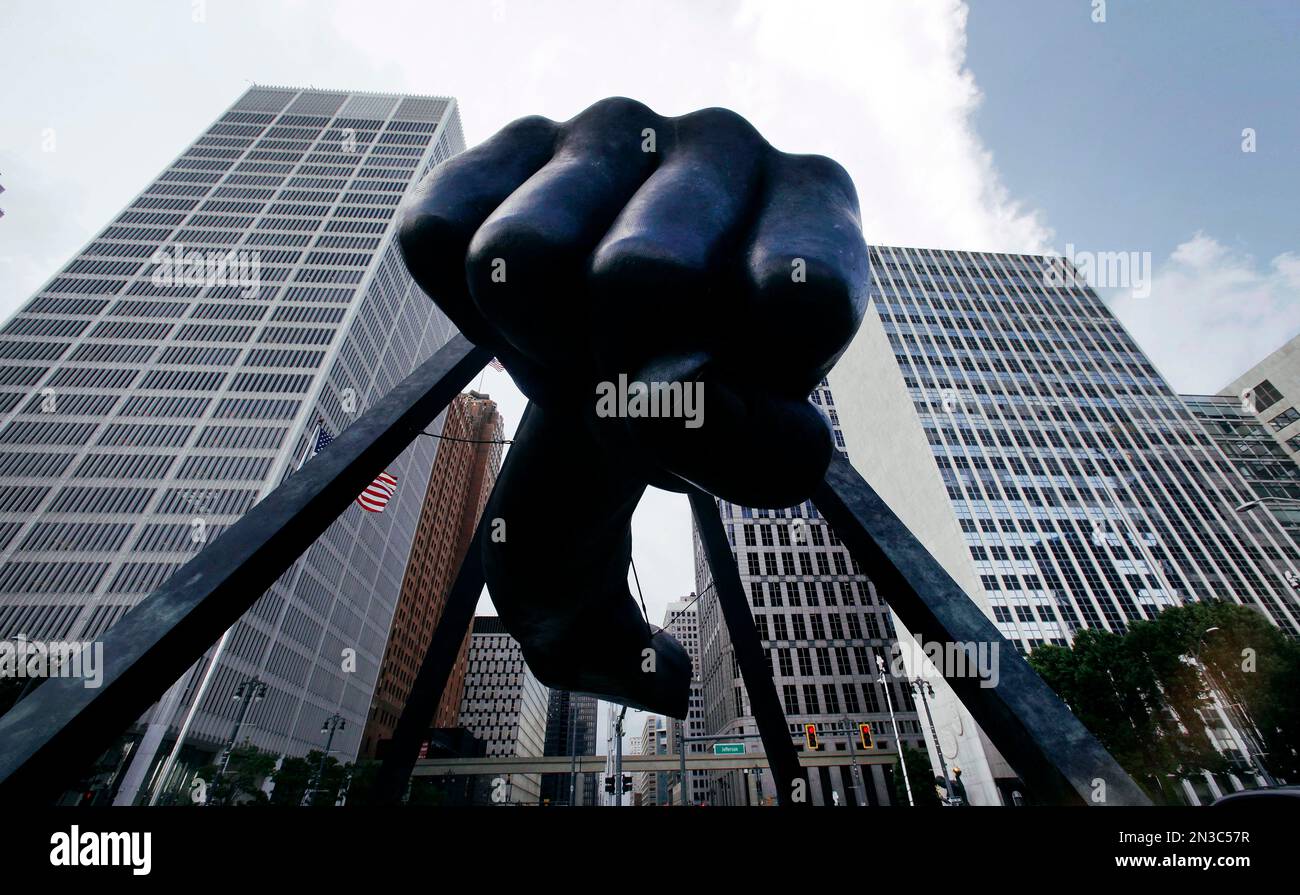 In this July 18, 2013 file photo, the Detroit skyline rises behind the ...