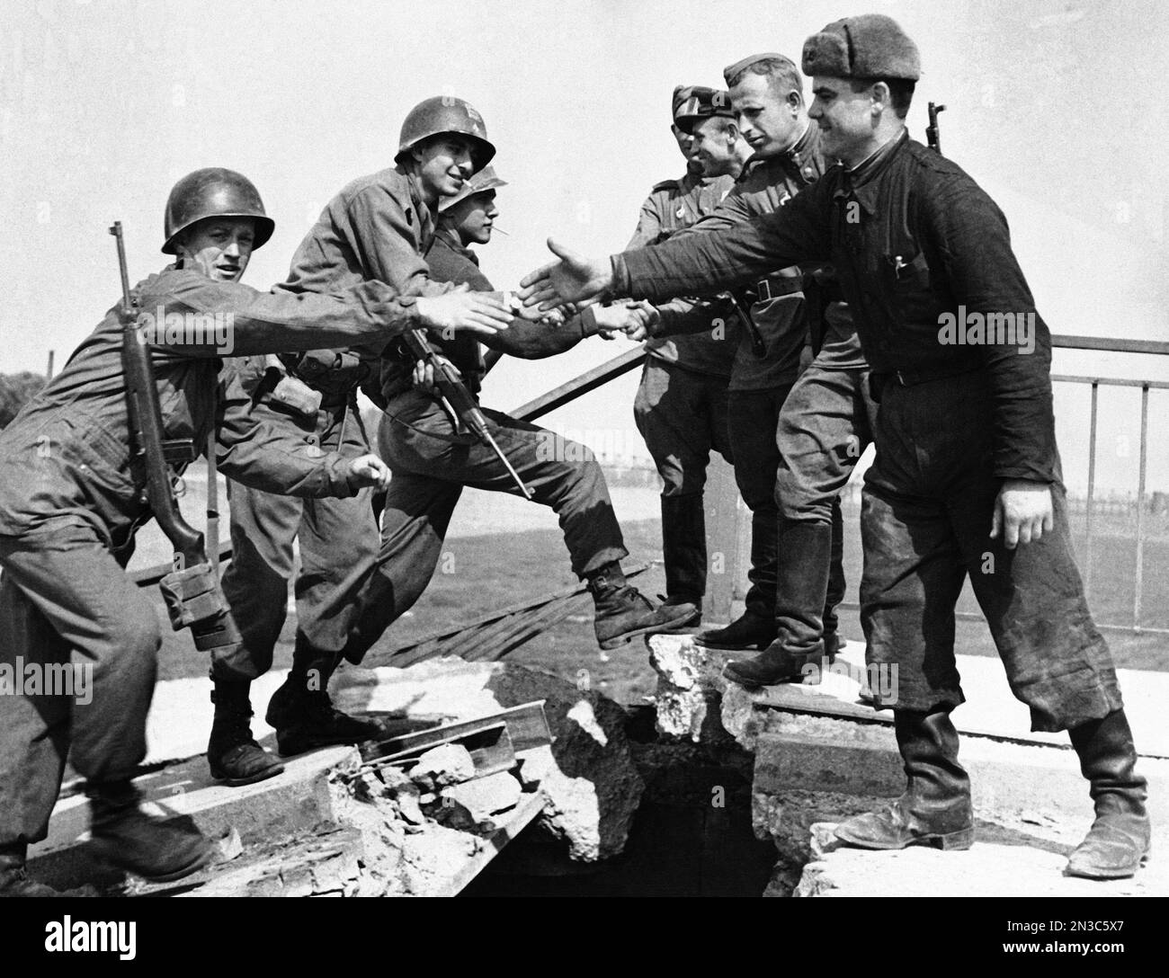 FILE - In this April 26, 1945, file photo, U.S. and Russian troops meet ...