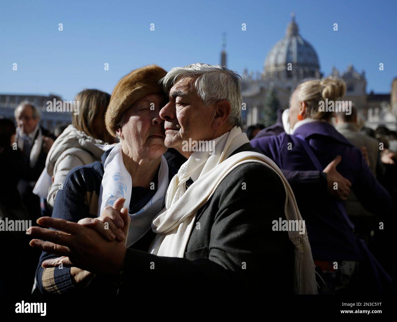 A couple dances tango in front of St. Peter's Square to celebrate Pope ...