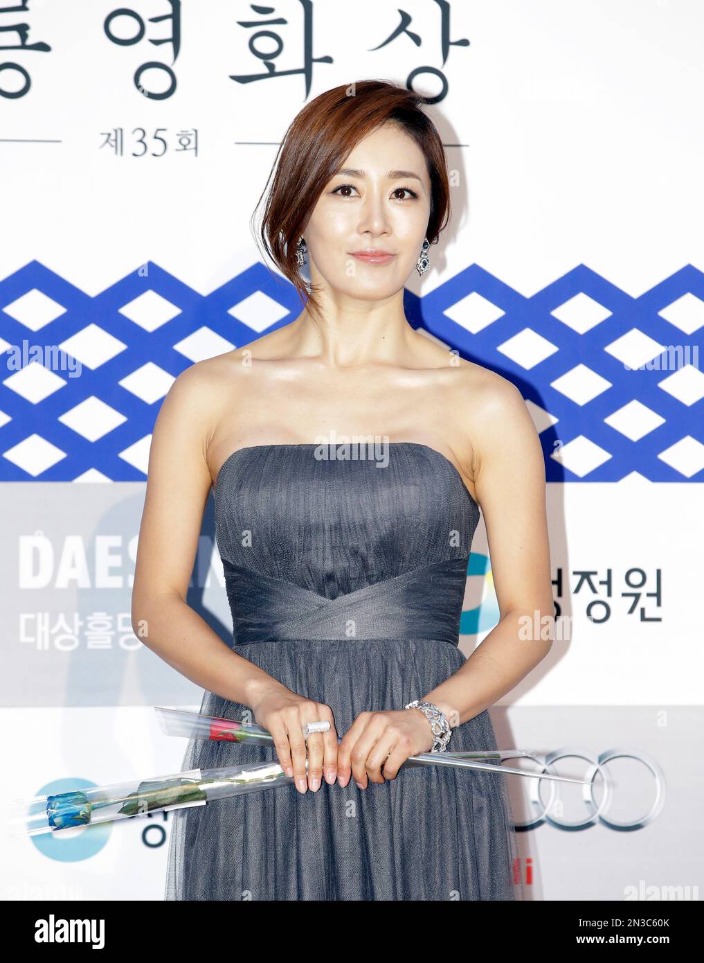 South Korean actress Moon Jung-hee poses for the media during a red ...