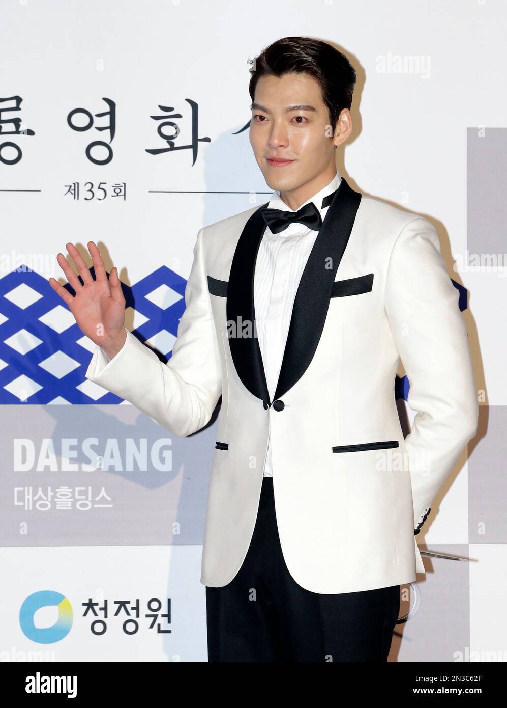 South Korean actor Kim Woo-bin poses for the media during a red carpet ...