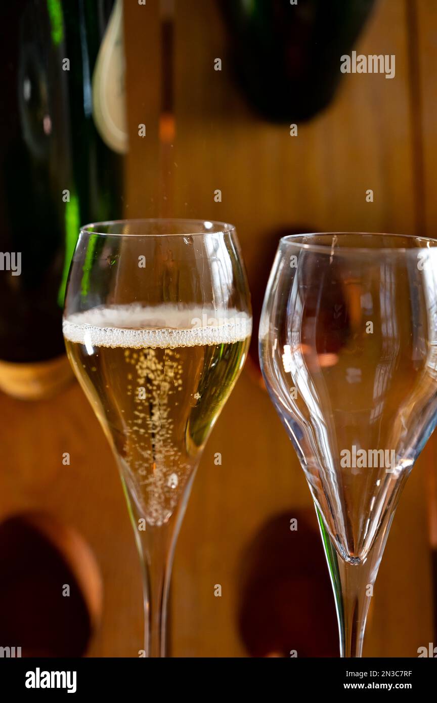 Glasses of sparkling white wine champagne gran cru or cava with bubbles ...