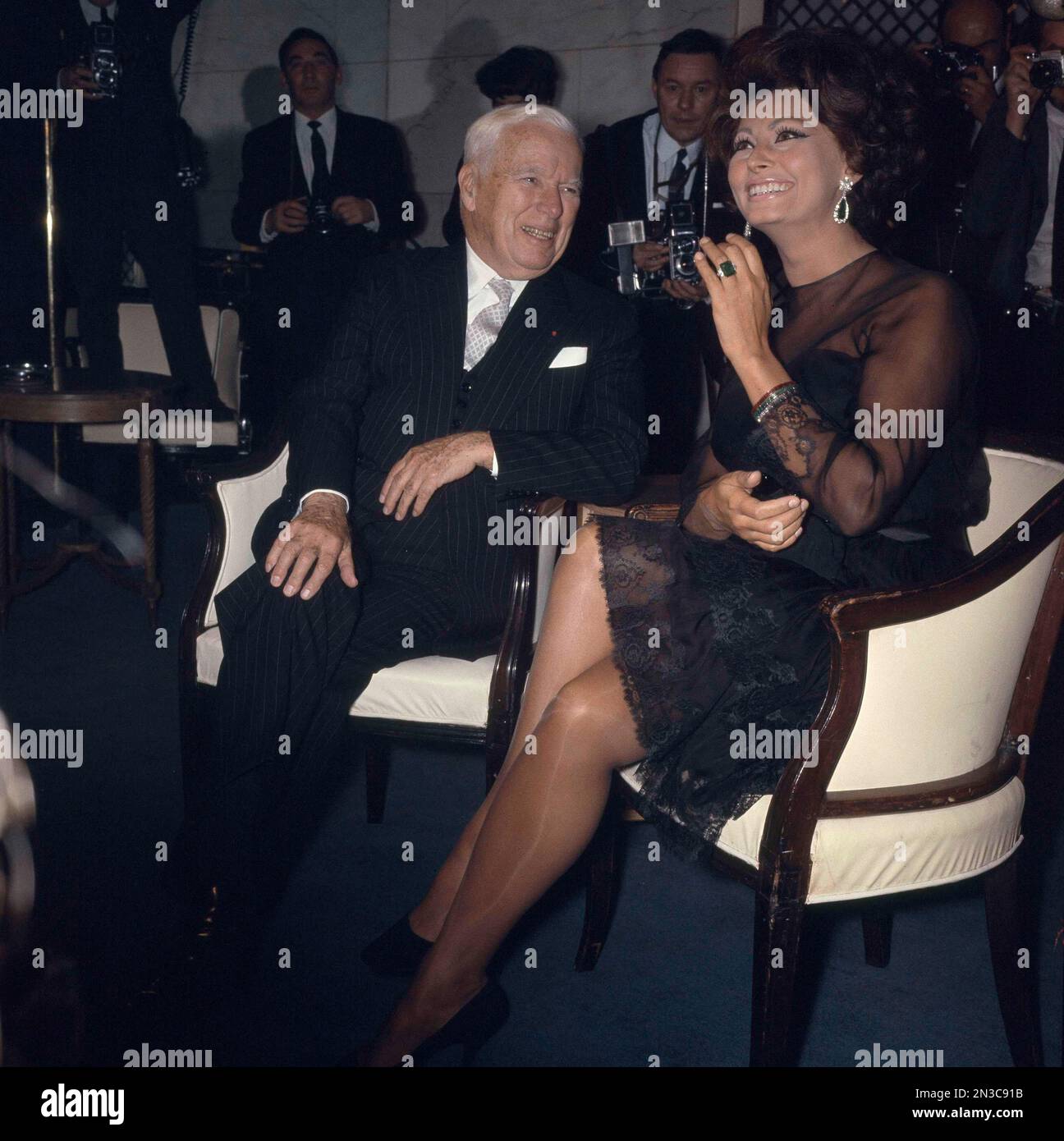 Sir Charlie Chaplin is pictured with Italian actress Sophia Loren in ...