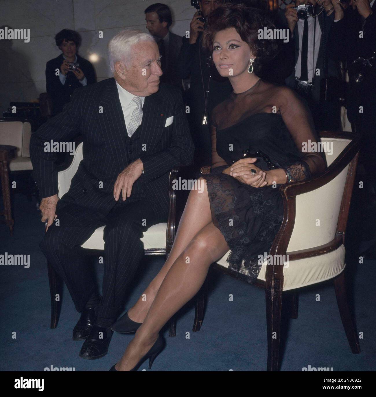 Sir Charlie Chaplin is pictured with Italian actress Sophia Loren in ...