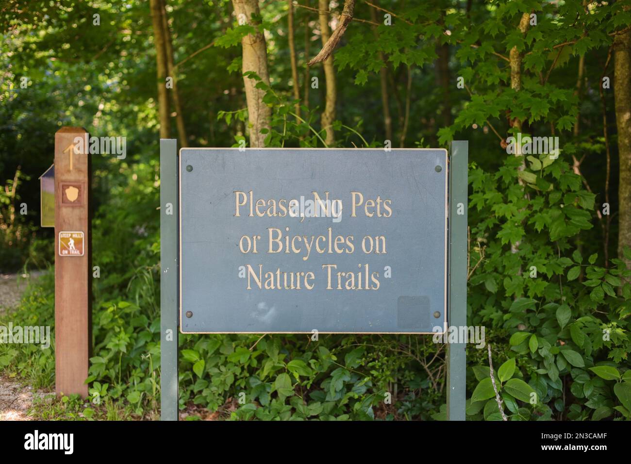 A sign of "please no pets or bicycles on nature trails" in Slate Run ...
