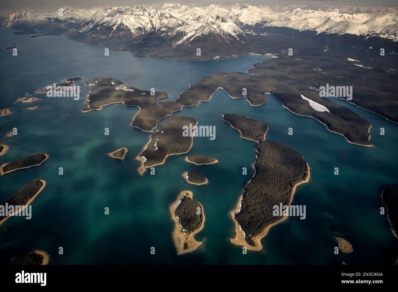 Islands are surrounded by icy waters near Glacier Bay National Park ...