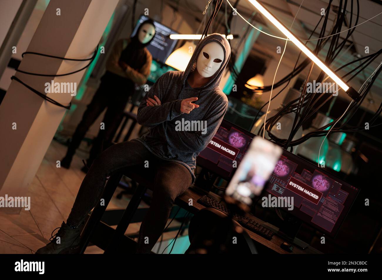 Anonymous hacker broadcasting live ransomware video, threatening to scam on camera, blackmail ...