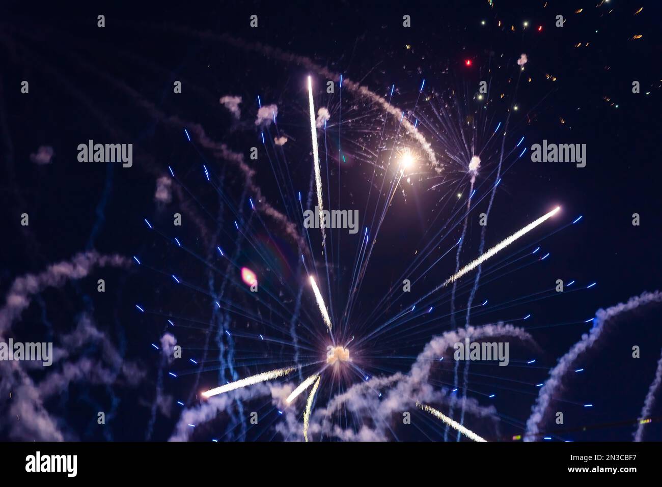 Bright light flash of fireworks, against the background of the night ...