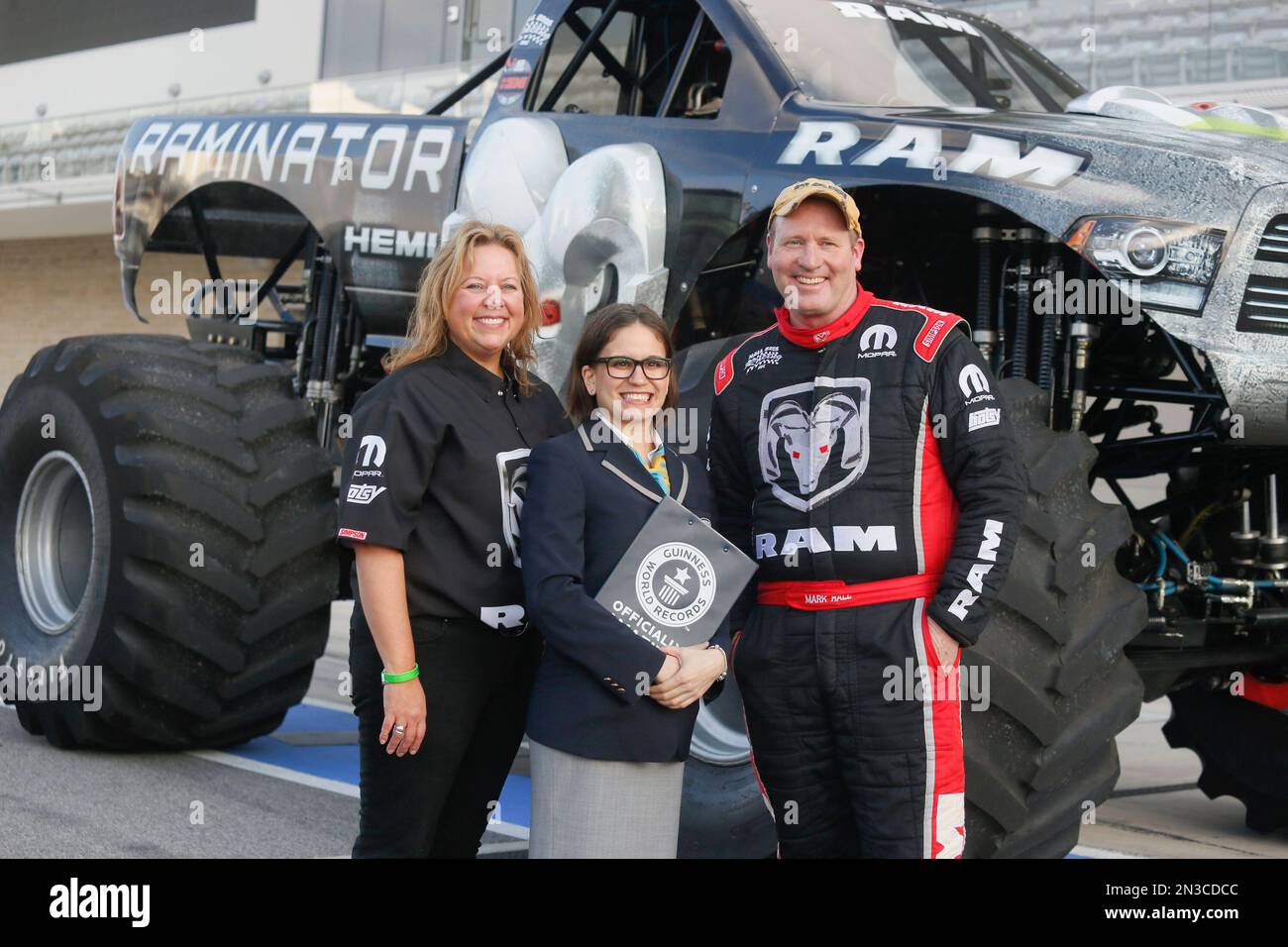GUINNESS WORLD RECORDS® adjudicator Johanna Hessling, center, poses ...
