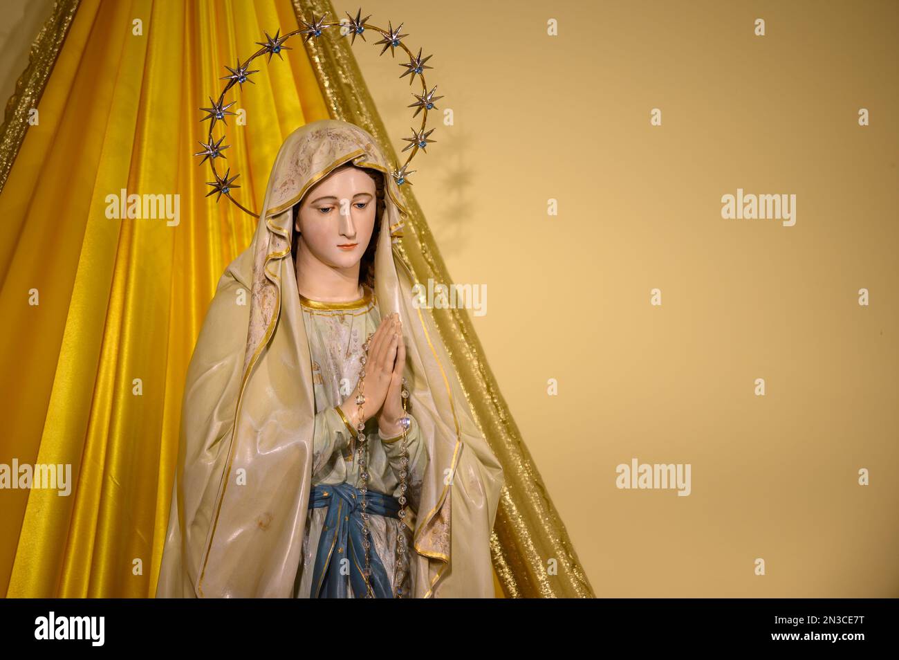 Statue of the Virgin Mary, the Queen of Peace, in the St James church ...