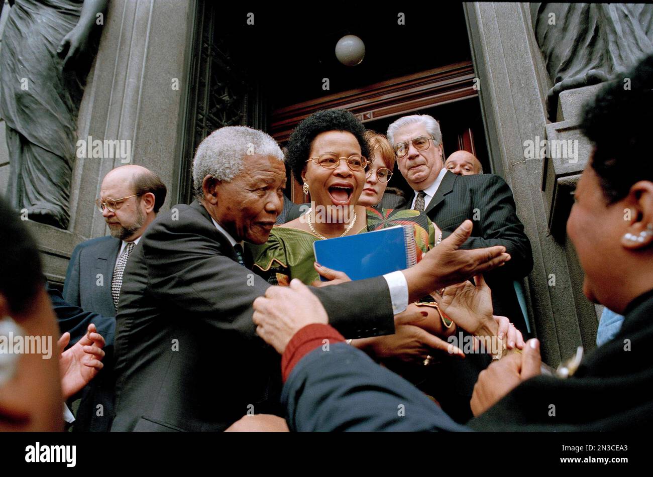 South African President Nelson Mandela and his wife Gracca Machel greet ...