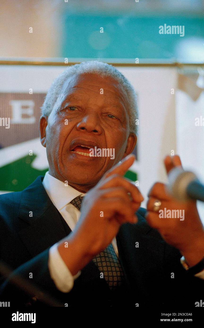 South African President Nelson Mandela talks to reporters in Ushuaia ...
