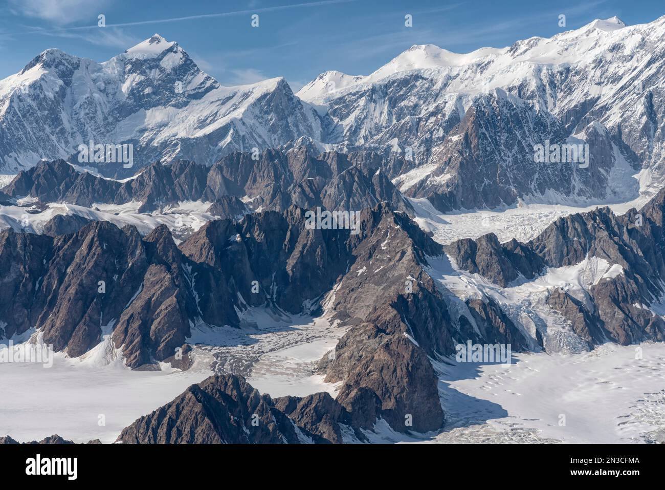Aerial view of the jagged rock pinnacles and the stunning, snowy ...
