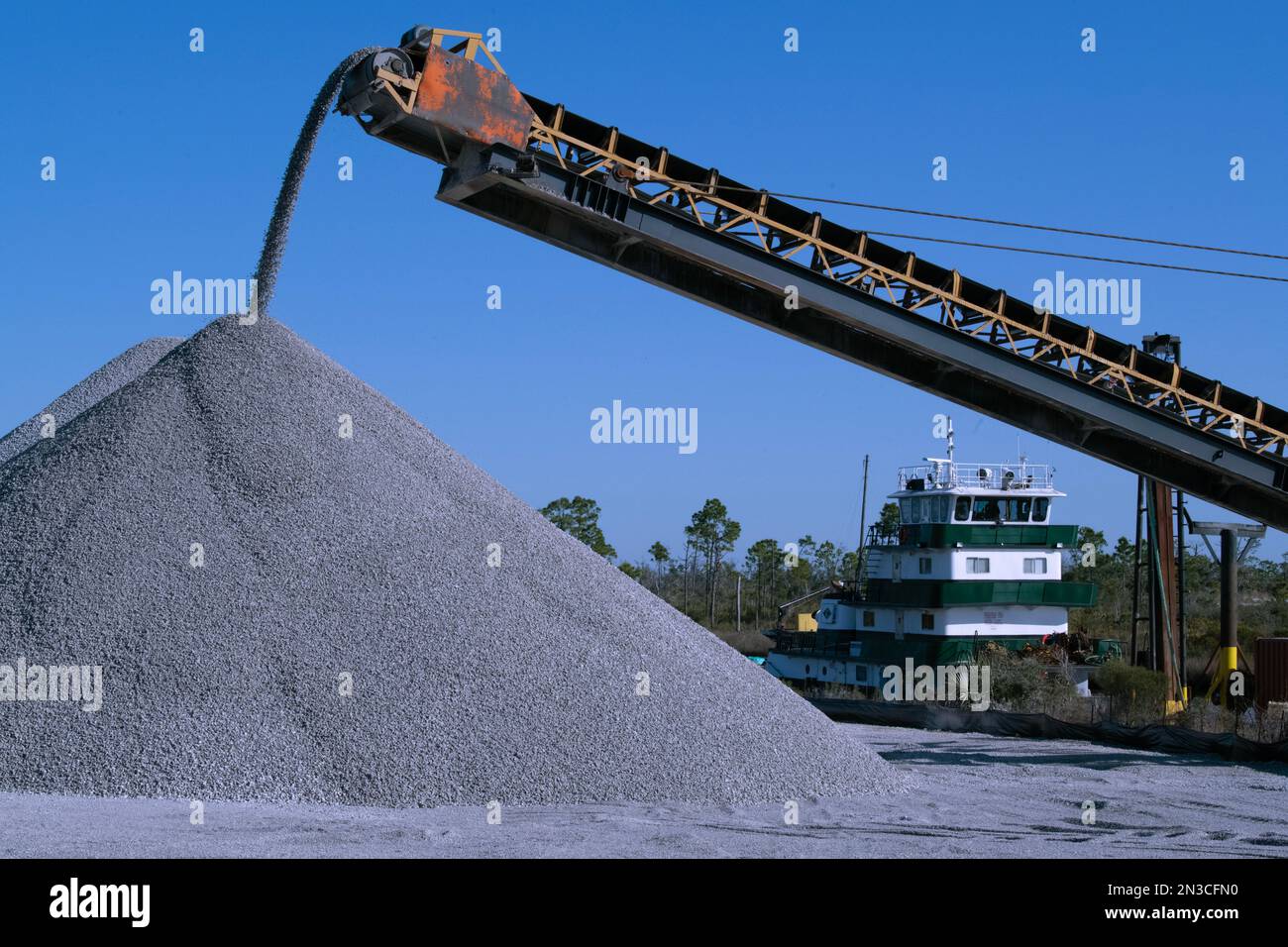 Tyndall welcomes one of many barge deliveries full of concrete ...