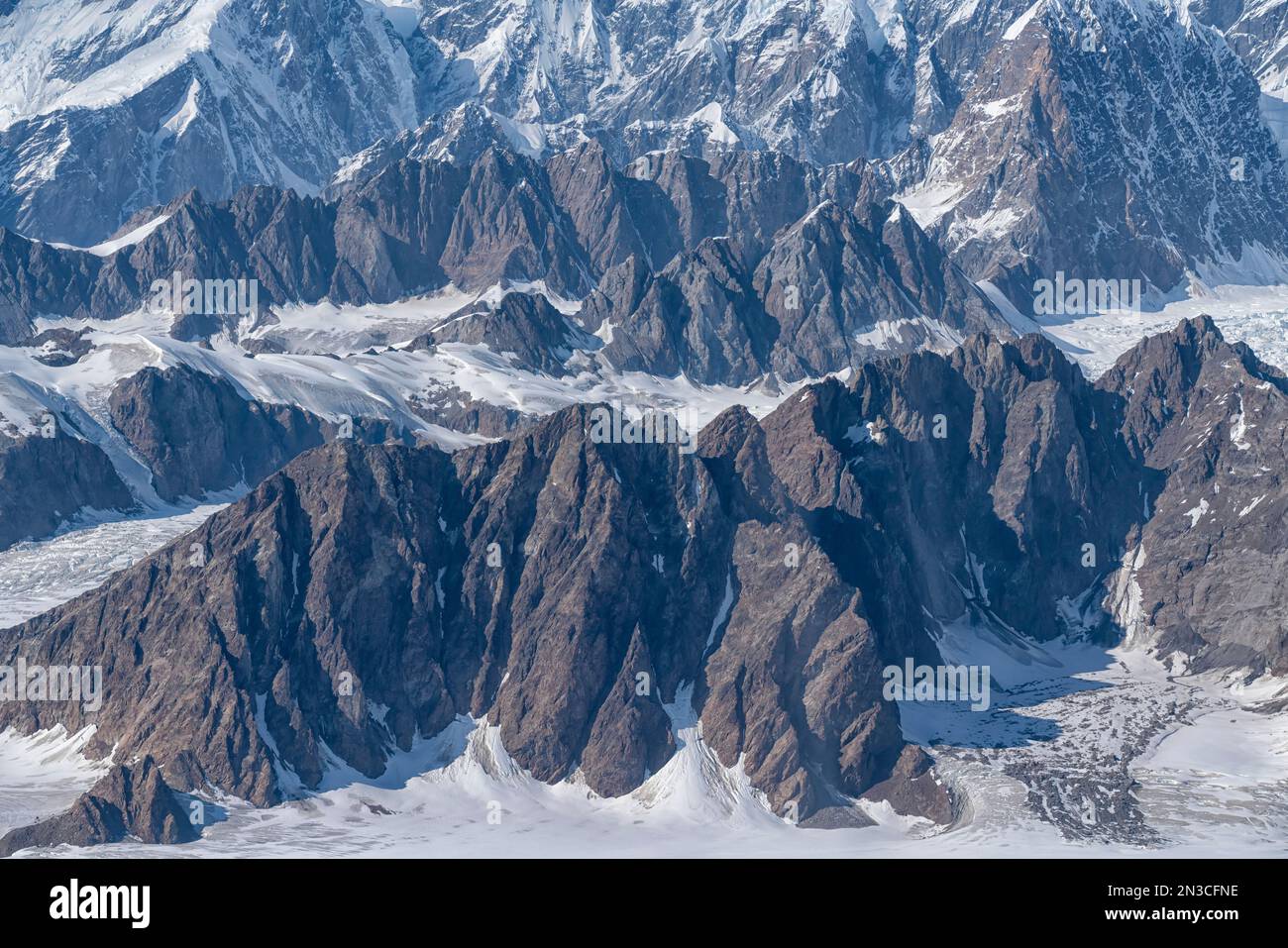 Aerial view of the jagged rock pinnacles and the stunning, snowy ...