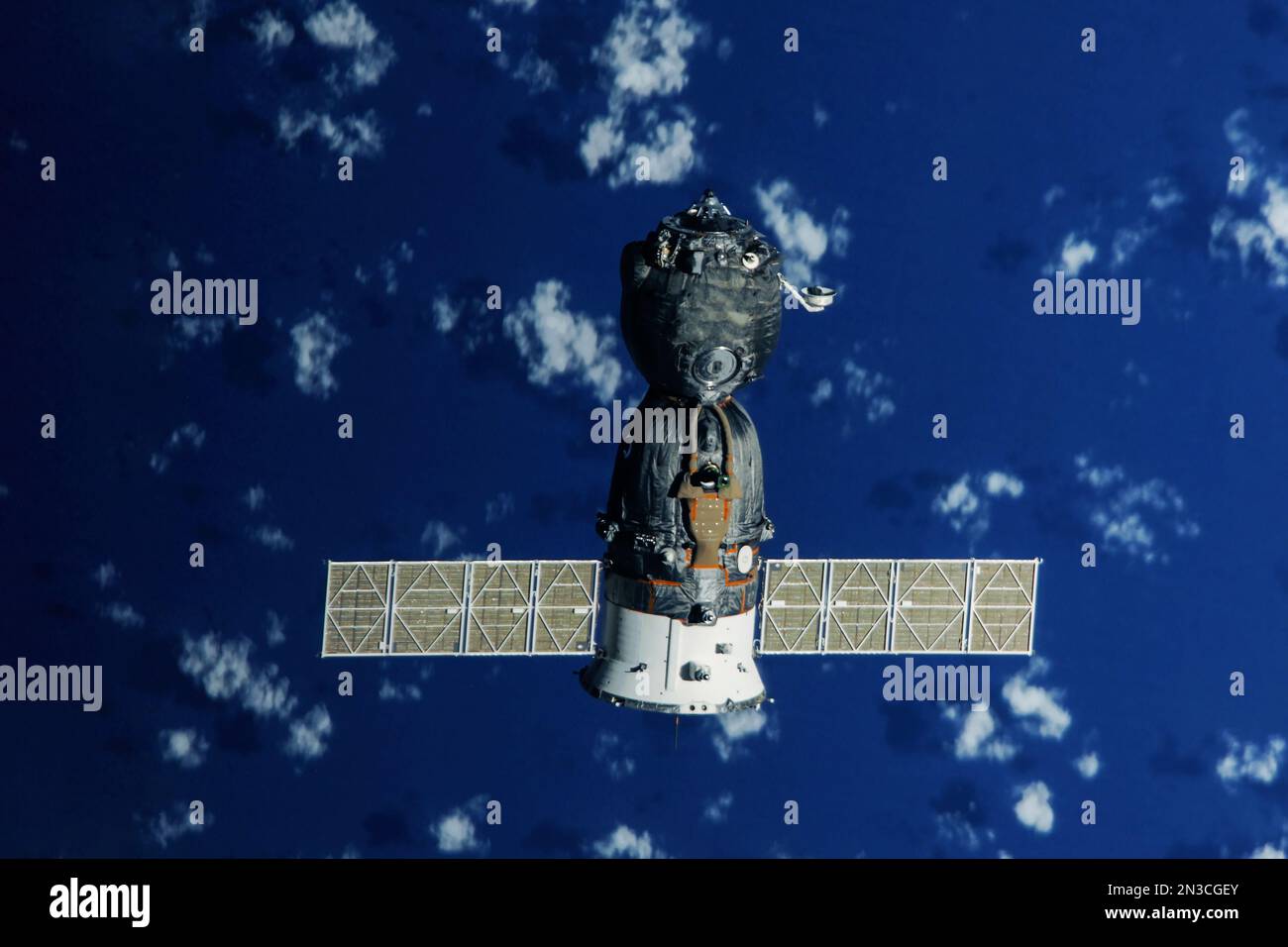 Space cargo ship in flight. Elements of this image furnished by NASA ...