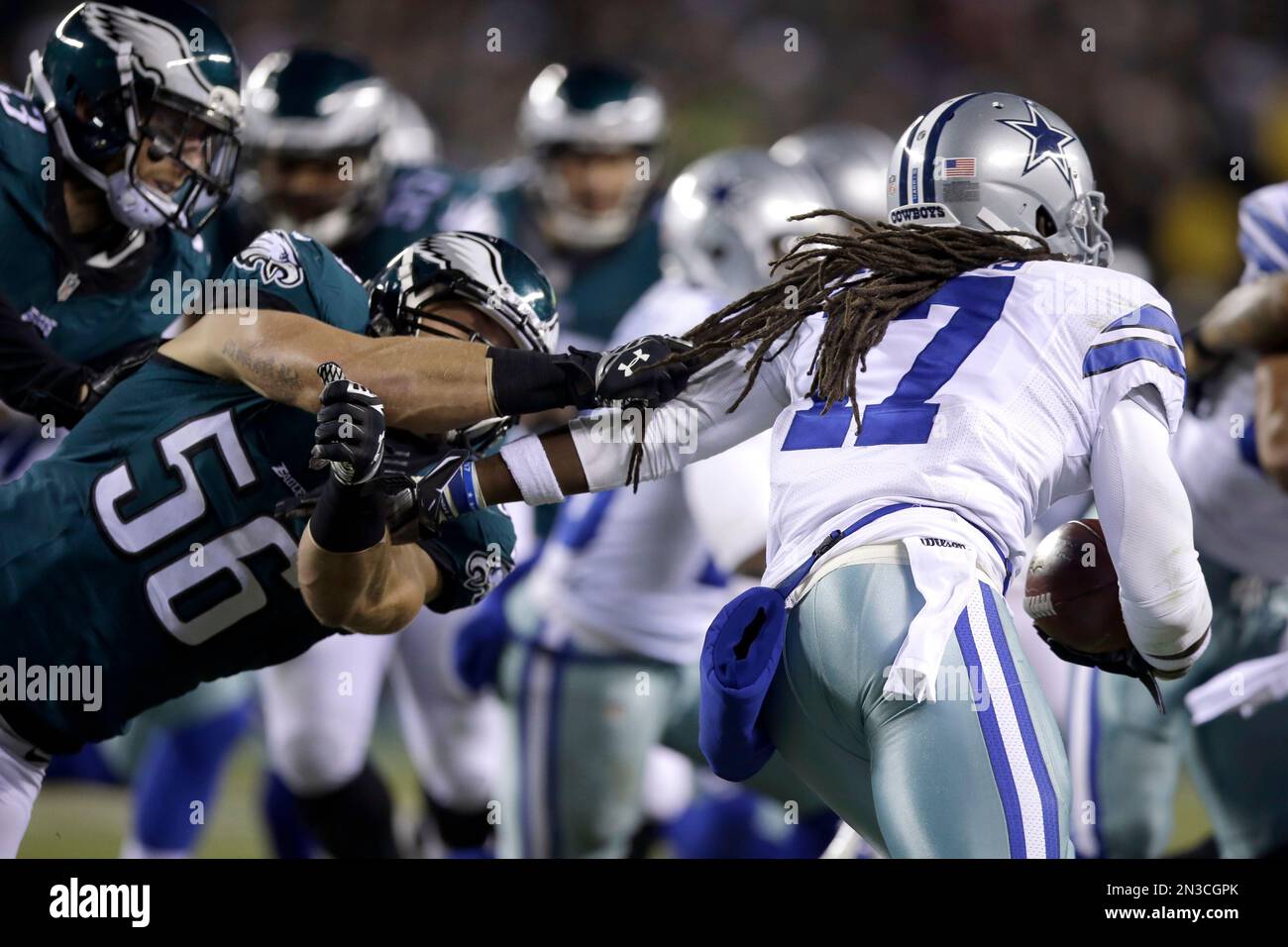 Philadelphia Eagles' Bryan Braman (56) tackles Dallas Cowboys' Dwayne ...