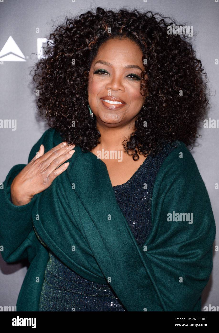 Producer Oprah Winfrey attends the premiere of "Selma" at the Ziegfeld ...