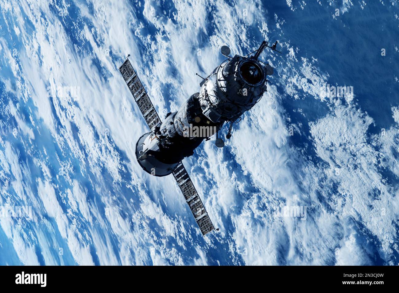 Space cargo ship in flight. Elements of this image furnished by NASA ...