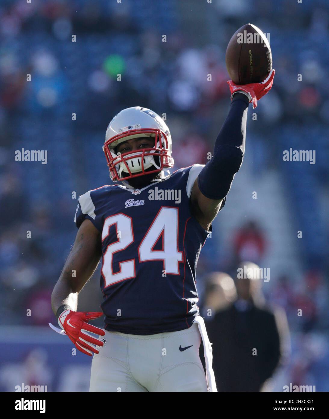 New England Patriots cornerback Darrelle Revis (24) tosses the ball ...