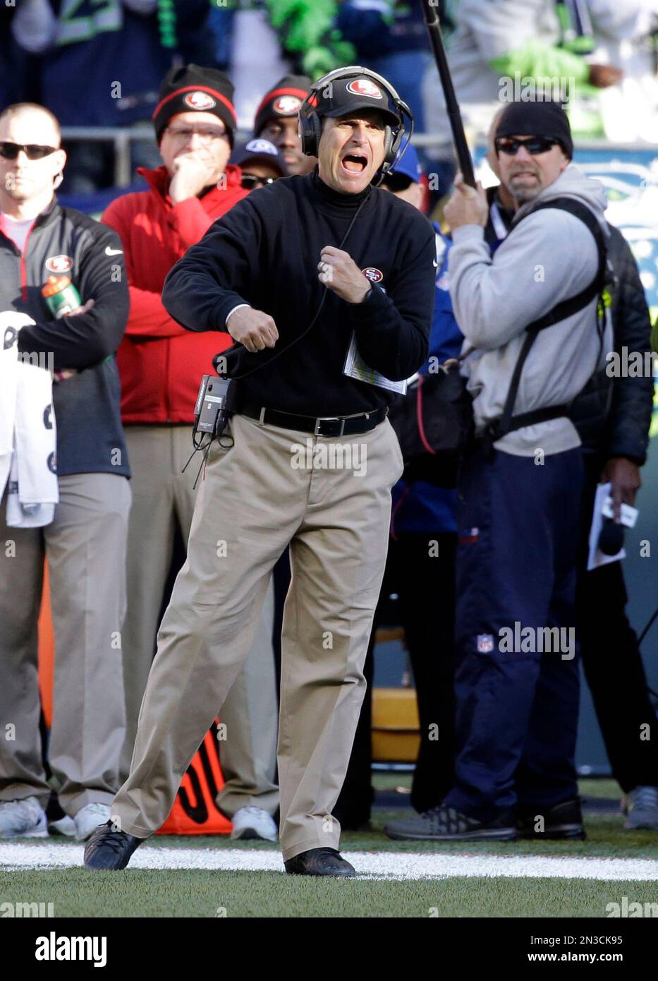 San Francisco 49ers head coach Jim Harbaugh yells from the sideline in ...