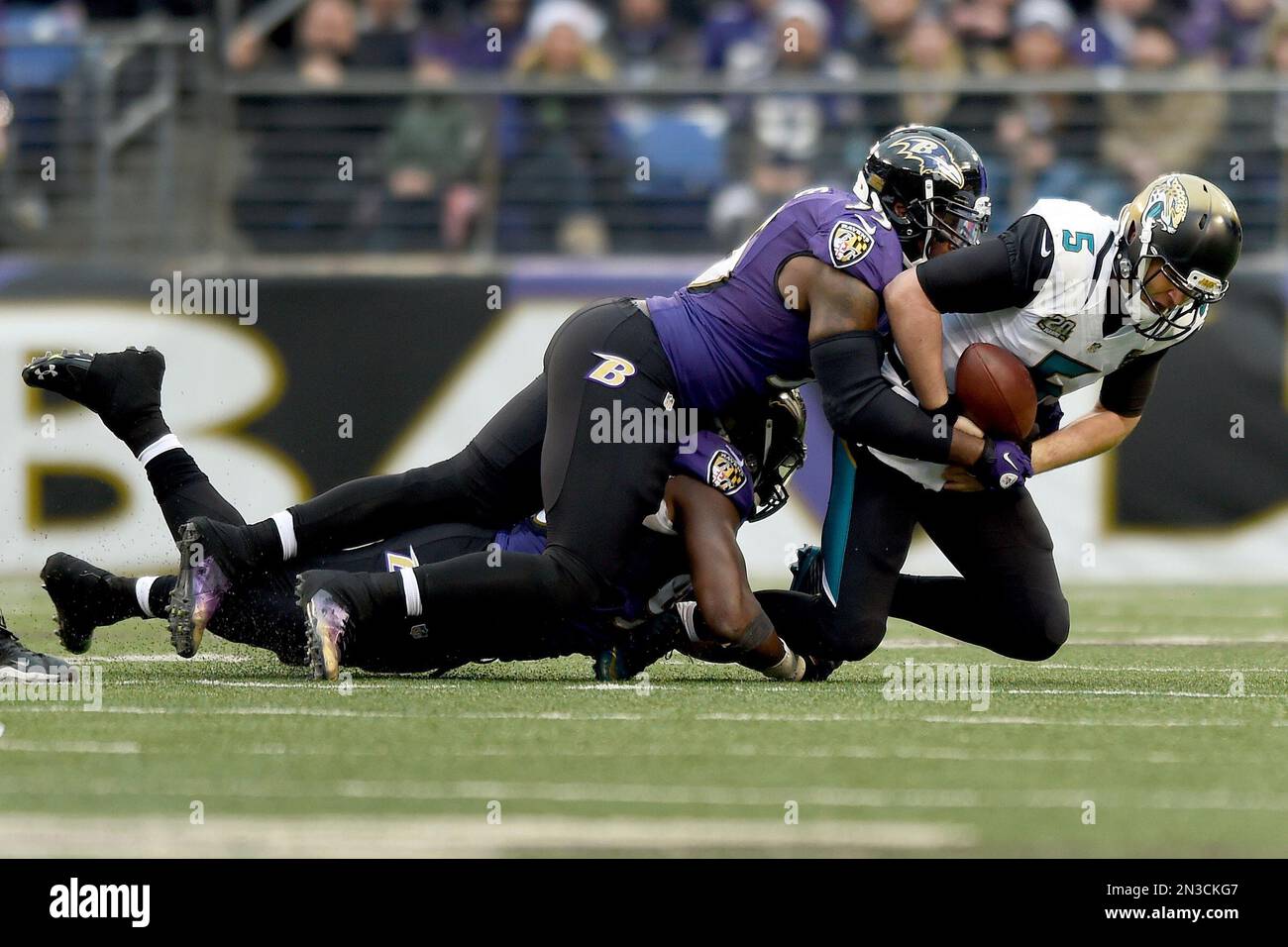 Jacksonville Jaguars quarterback Blake Bortles (5) is sacked by ...